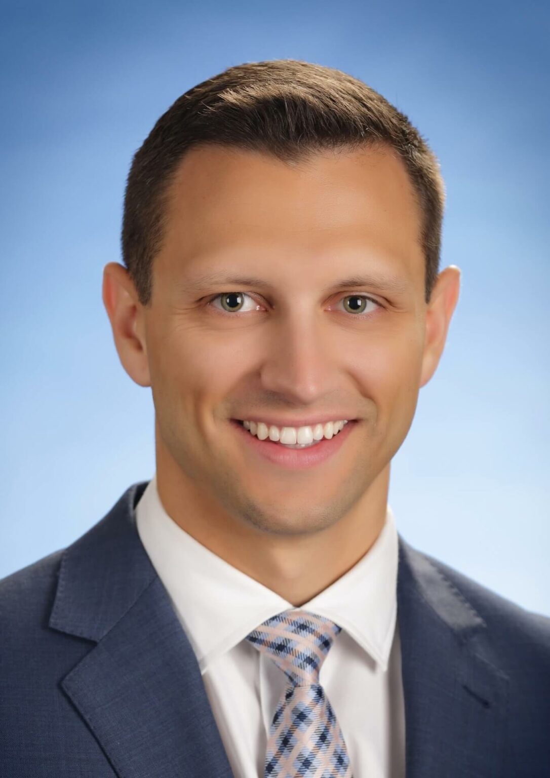 Adam T. Mueller, OD, FAAO | Bennett & Bloom Eye Centers